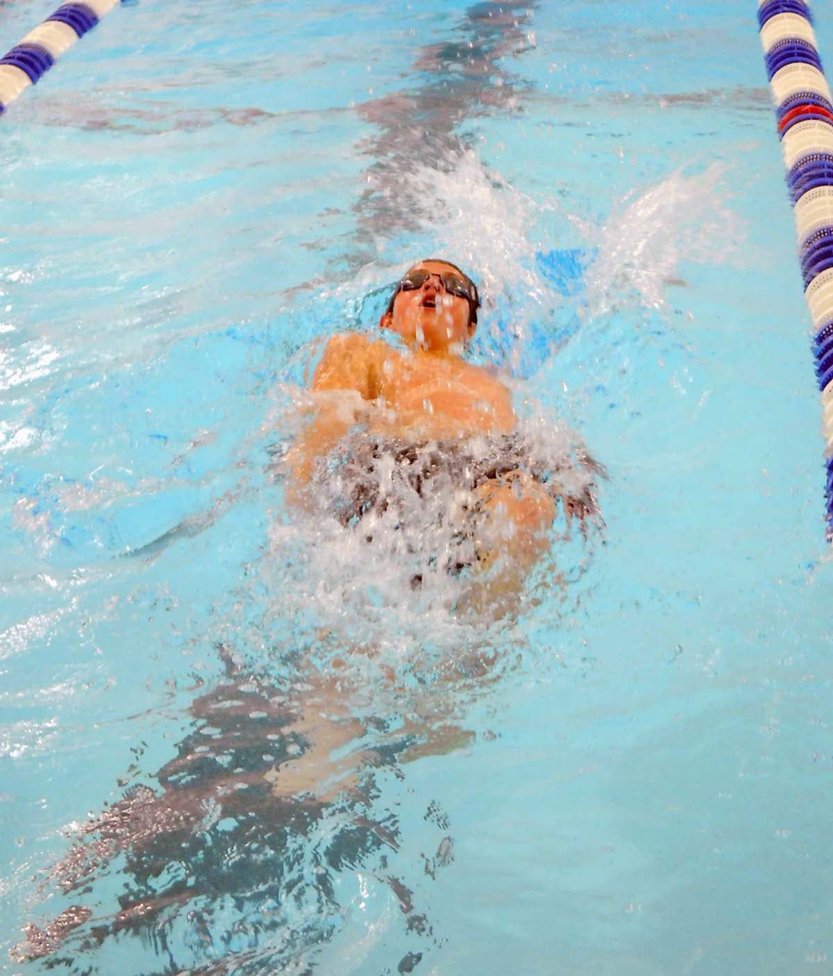 Huskies beat Austin swimmers