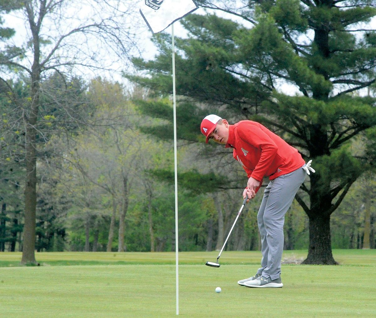 Packers take fourth in home golf meet