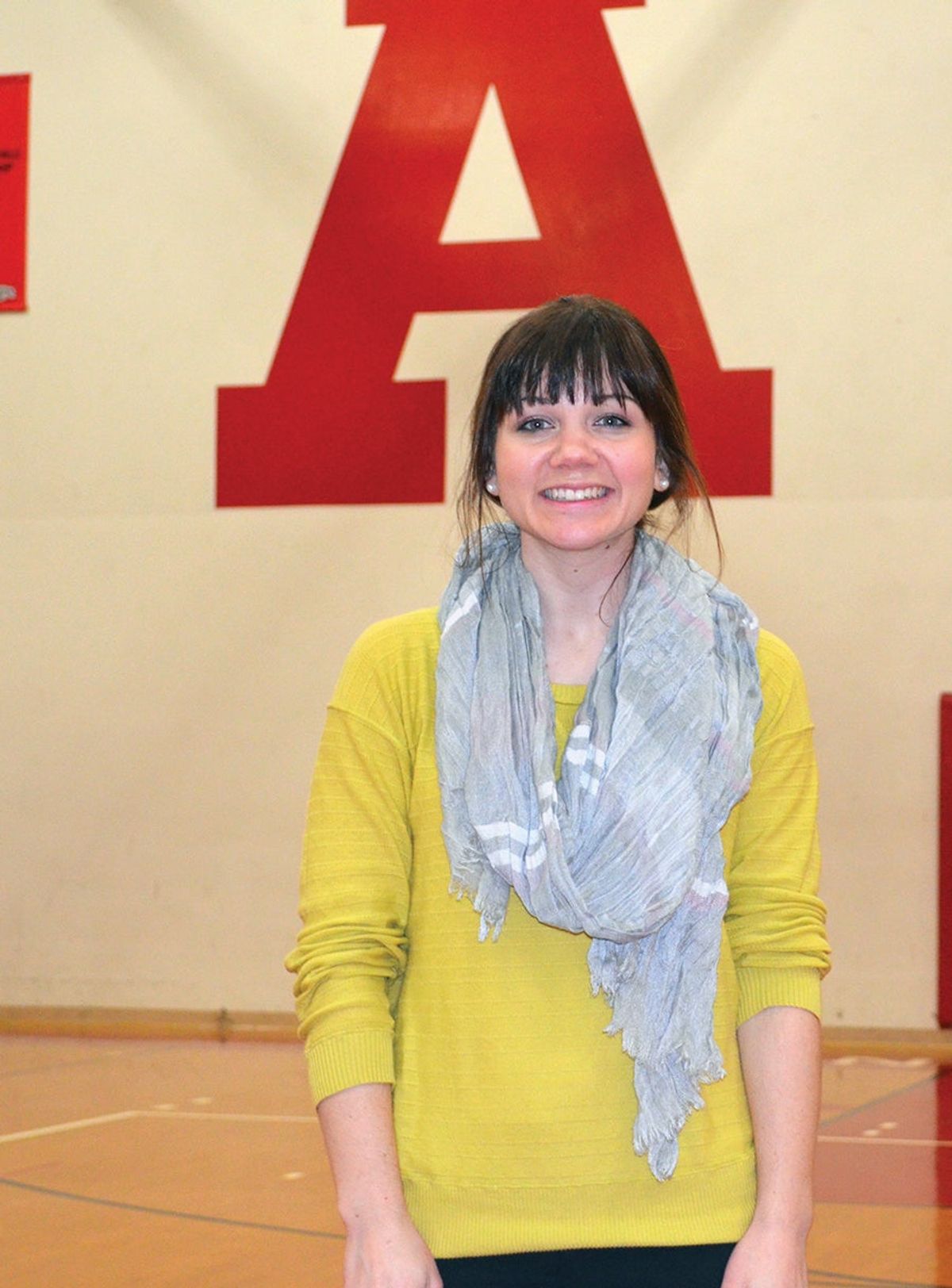 Former Packer golfer comes back to coach at AHS