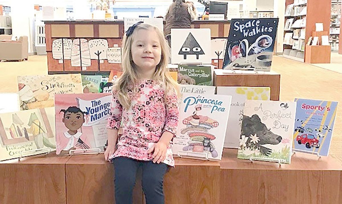 Little Tyke has her own 'surprise' party for the Austin Public Library