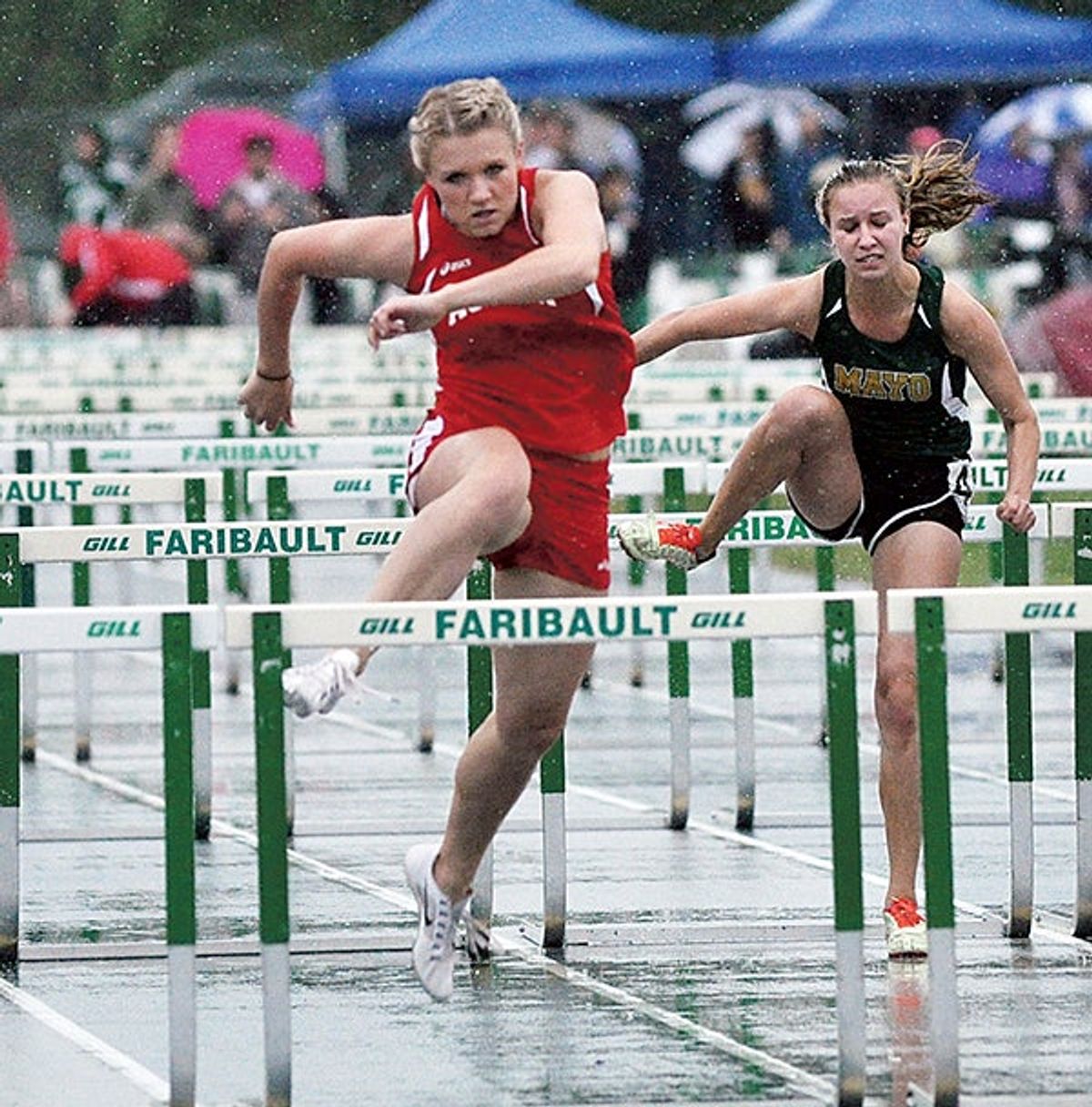 Over the top: Austin senior runner re-sets two school record...