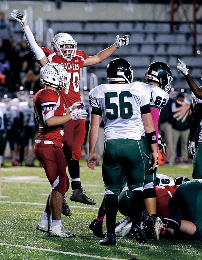 Pack plays big against Falcons; Austin football team wins 3rd straight...