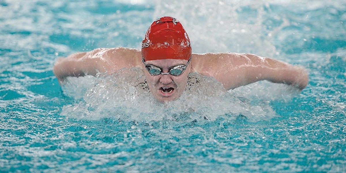 Packer swimmers fall to Winona