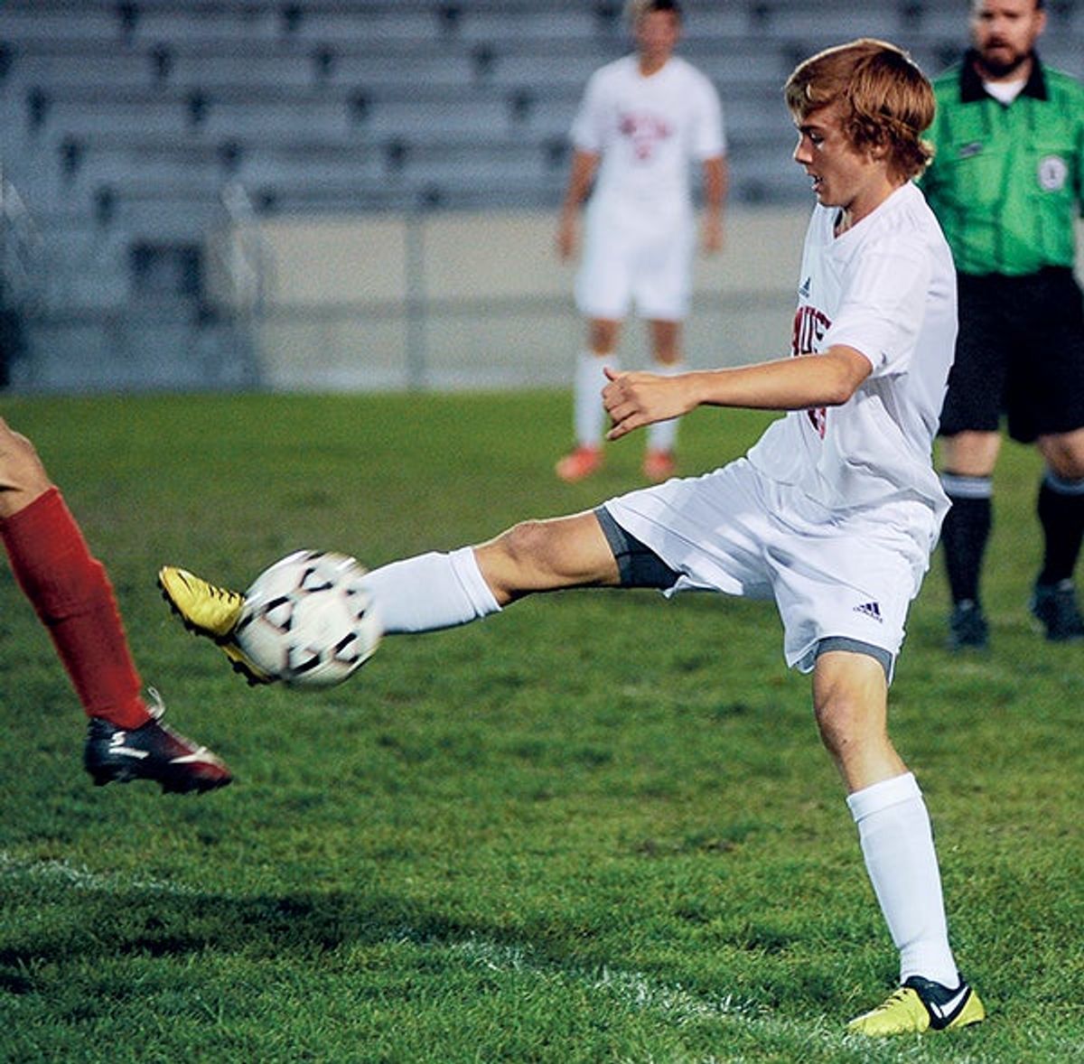 Packer boys open soccer playoffs with a big win