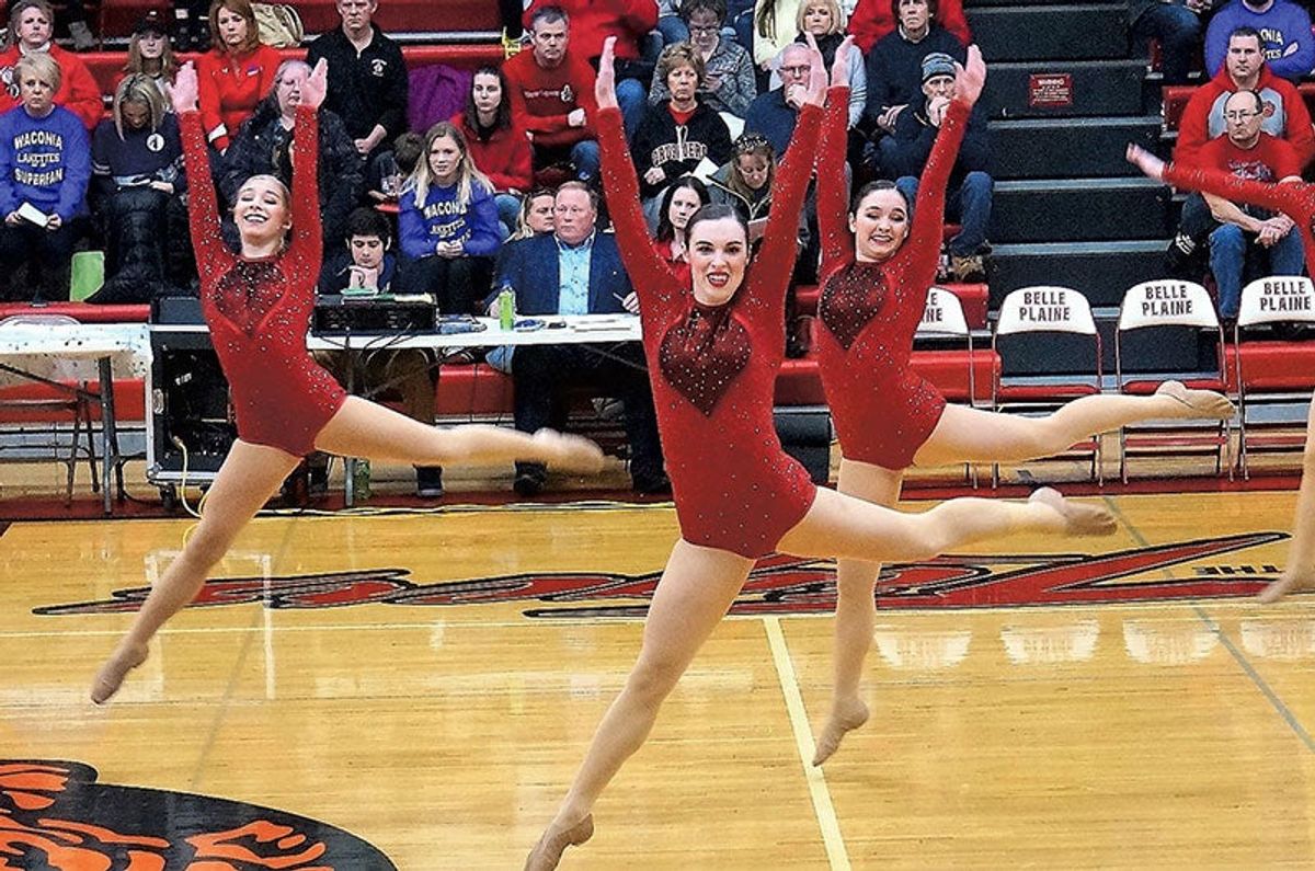 Photo: Austin Packer dance team wins high kick in Holy Angels