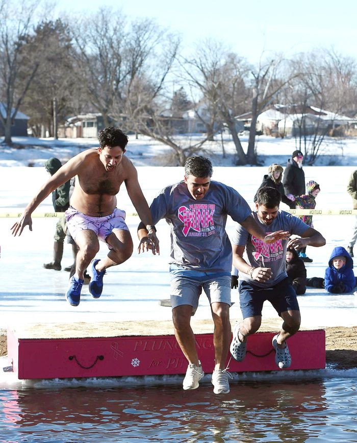 PHOTOS: Jumpers hit the frigid waters for this year's Plunging for pin...