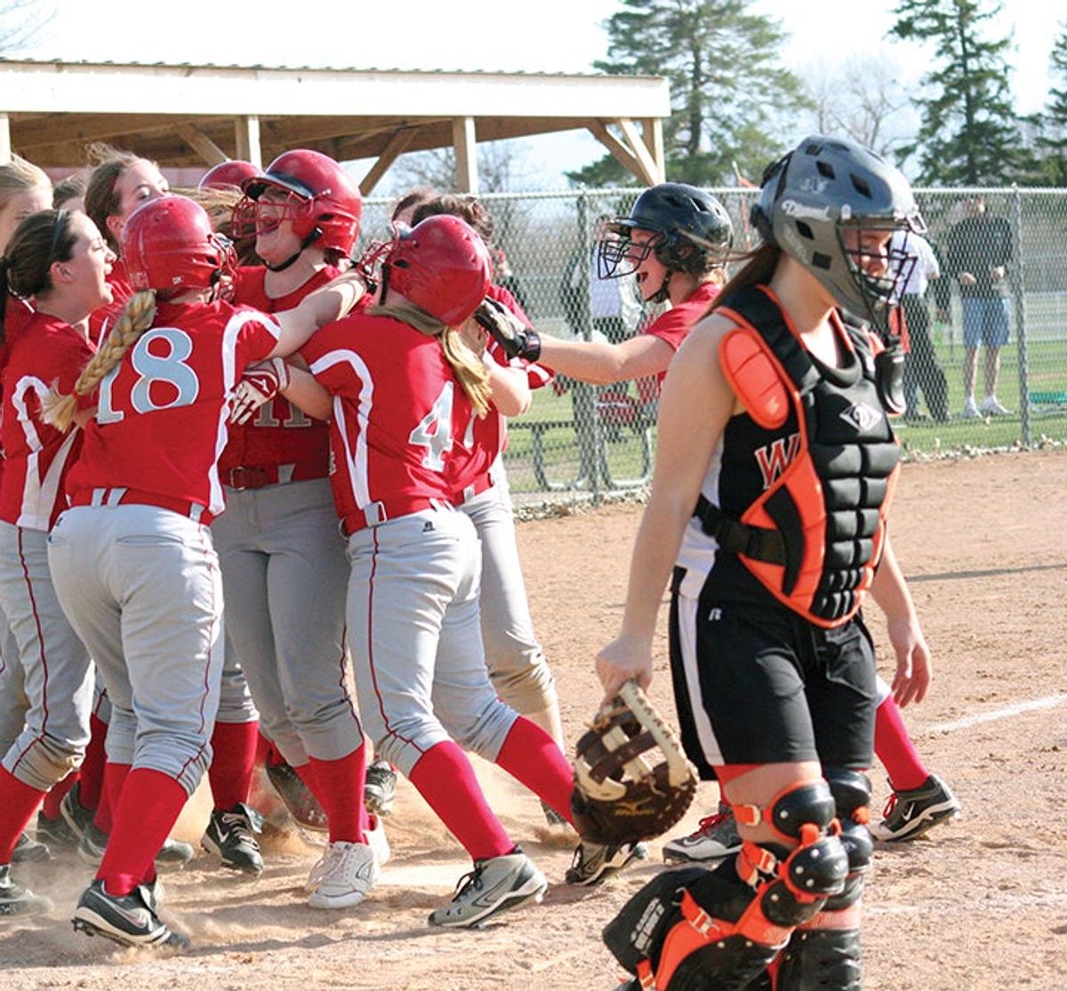 Ball's walk-off grand slam lifts Packer softball team