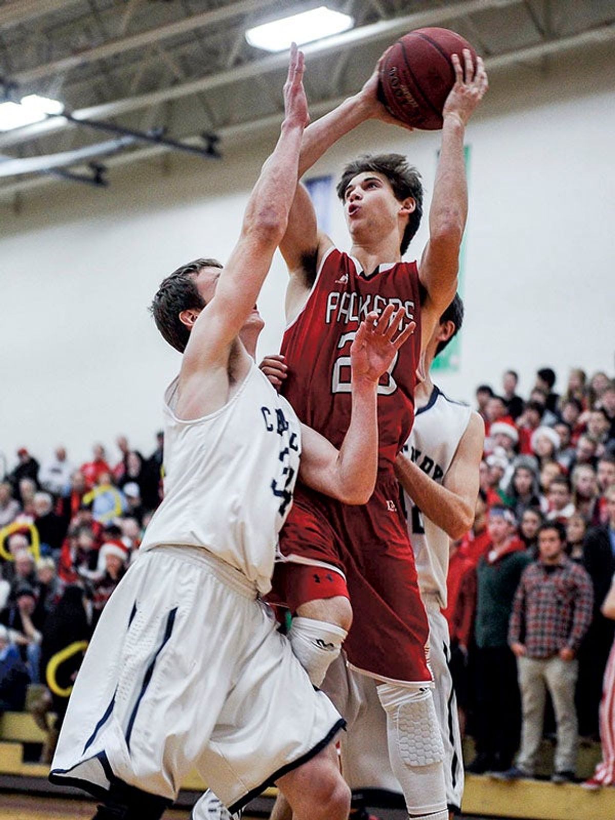 Boys basketball: Packers get scoring boost from freshman in win over P...