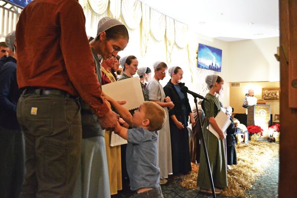 Dexter Christmas Reading draws crowd indoors with carols, cookies, and...