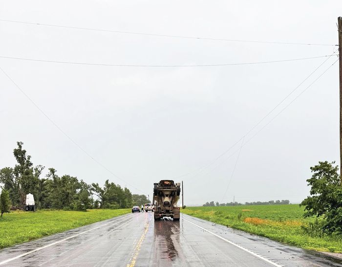 Concrete truck tangled in power lines shuts down Highway 25 ...