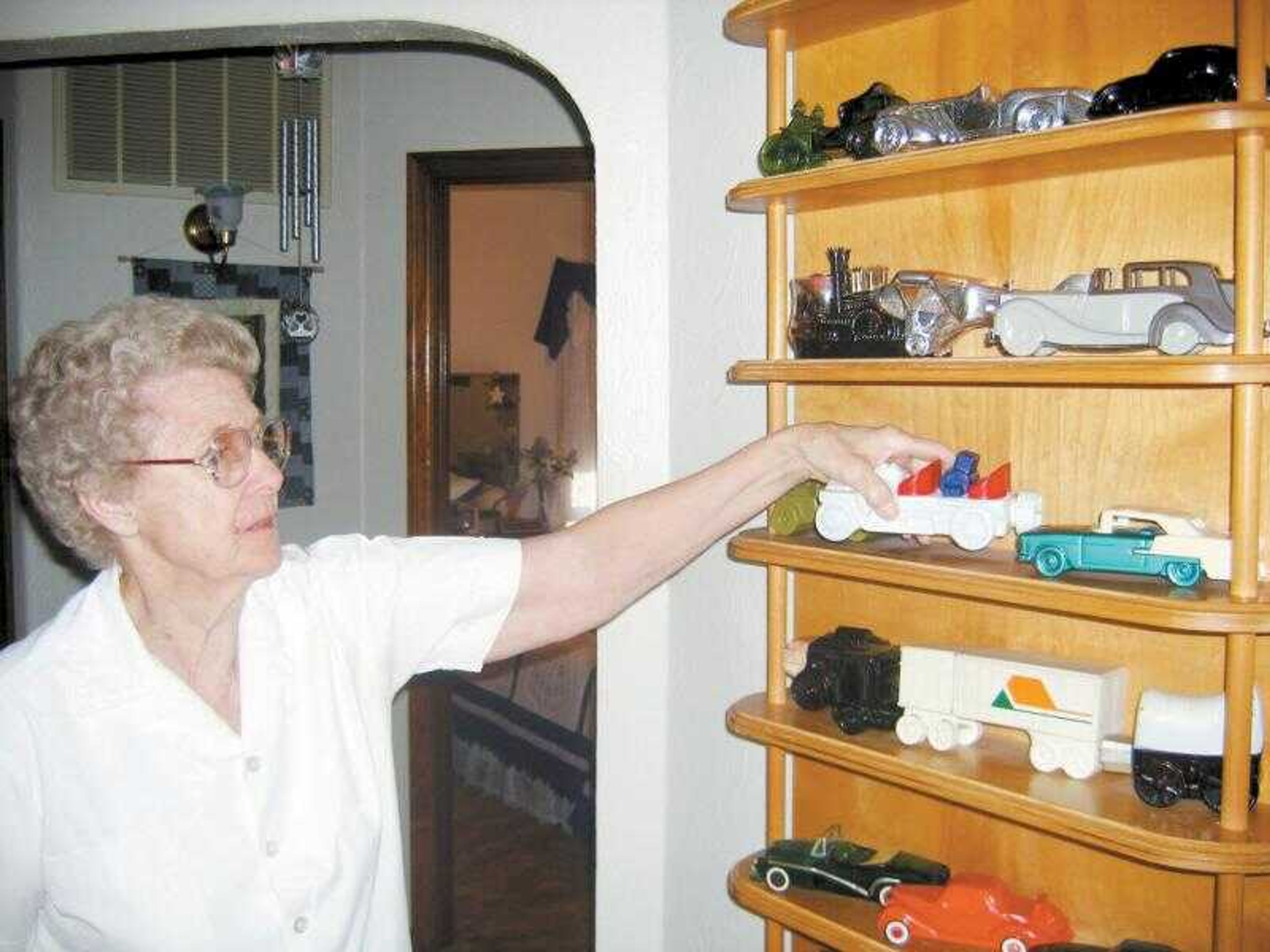 Dexter woman has collected 200 Avon cologne bottles