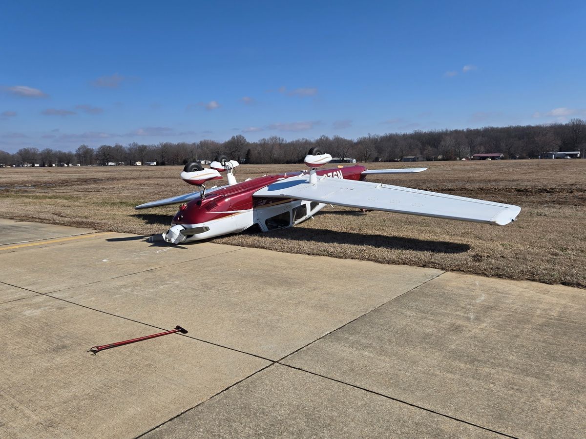 Unoccupied single-engine plane flipped by larger aircraft's prop wash