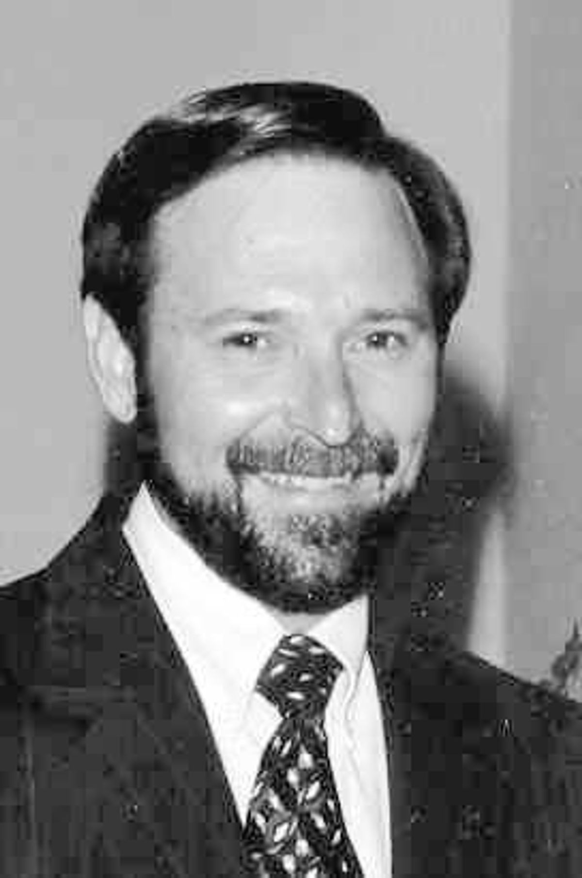 Dennis L. Scherer