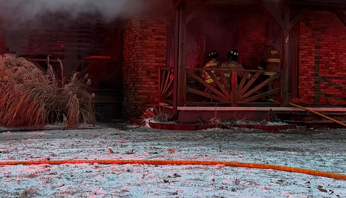 Advance firefighters battle frigid structure fire as hidden flames for...