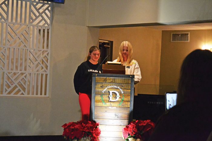 Dexter Christmas Reading draws crowd indoors with carols, cookies, and...