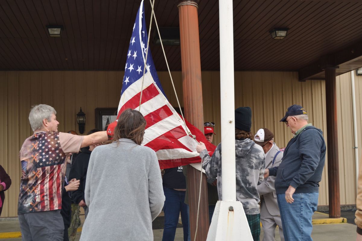 Navy veteran teaches flag etiquette to dayhab class