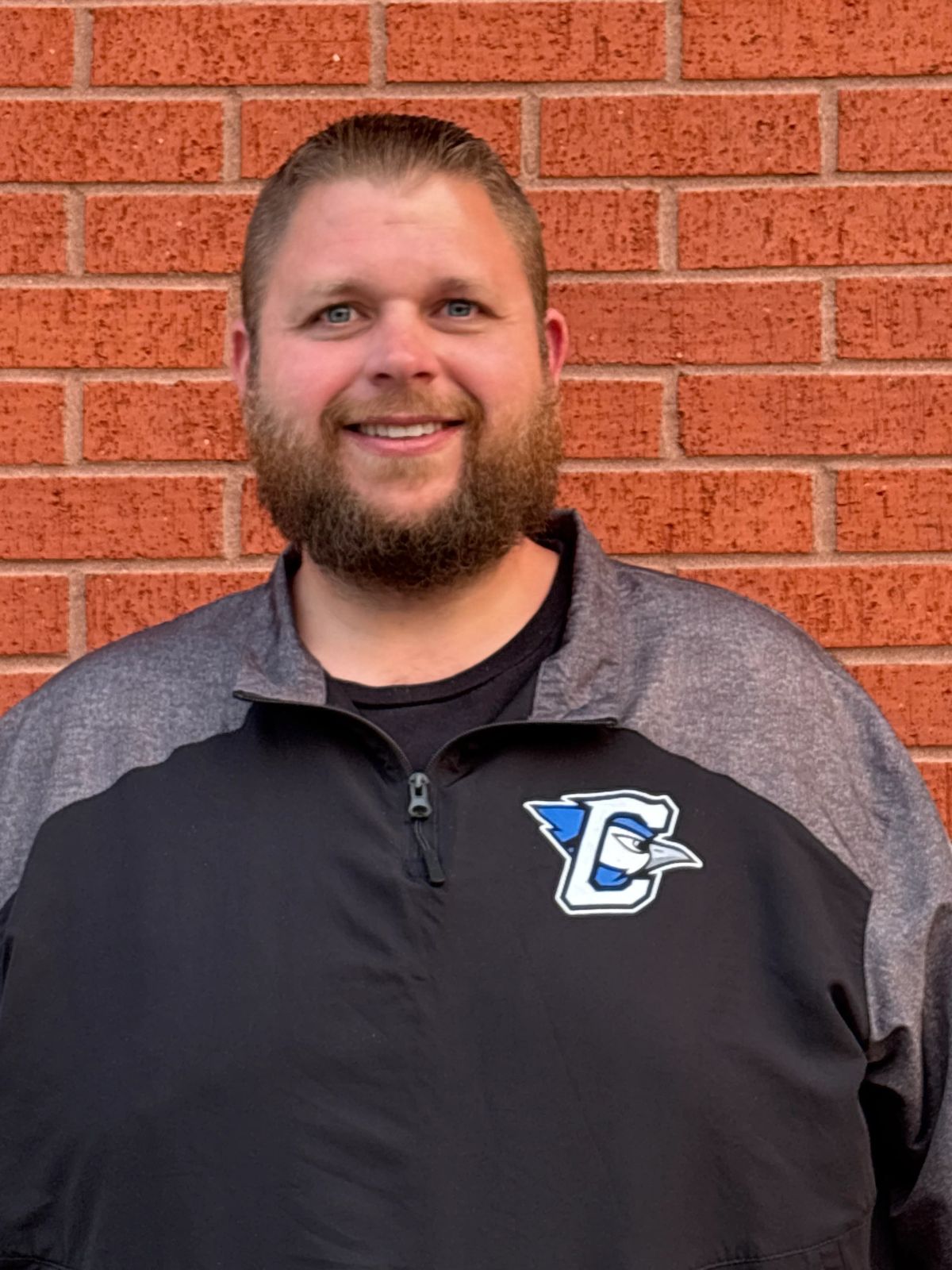 Charleston hires veteran coach Trent Adams to lead program