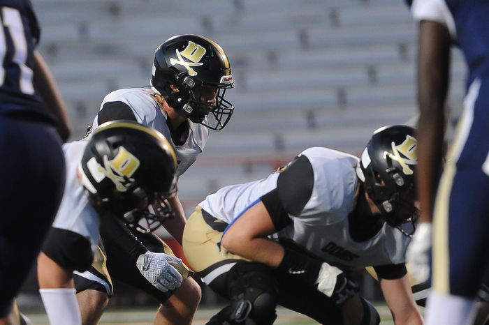 Saxony football's home debut ends in stifling win over Doniphan