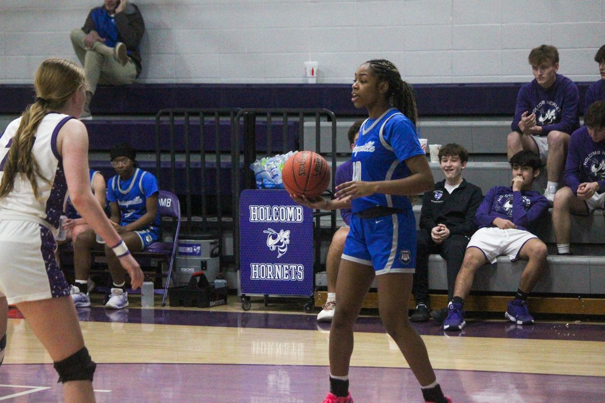 Farmer scores 30 as Portageville rolls past Holcomb 74-23