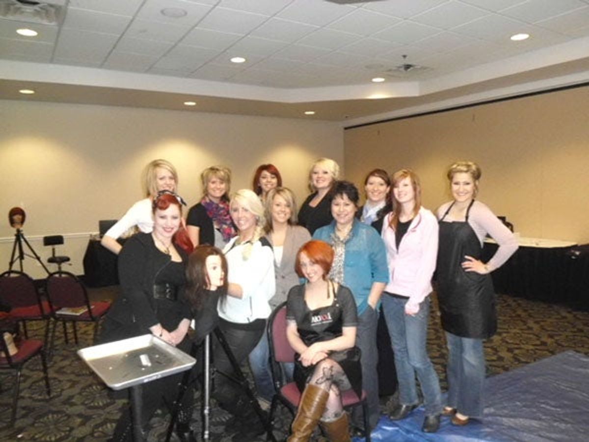 Salon staff learn hair color, cut tips