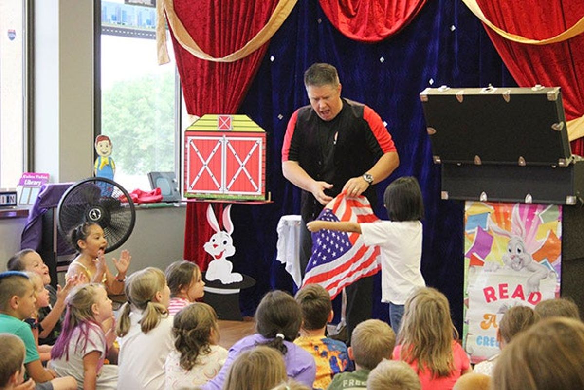 Magician Greg the Great entertains at the Albert Lea Public Library