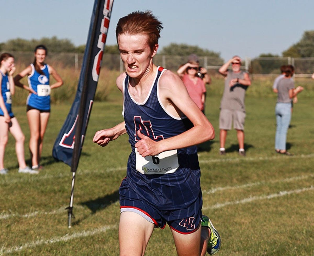 Albert Lea's Hanke wins first home meet of season