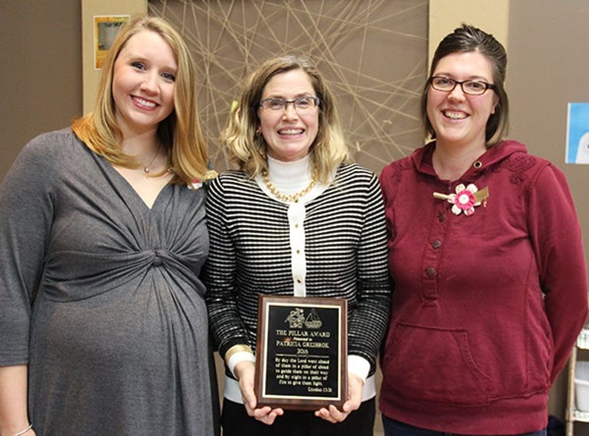 Librarian recognized for service