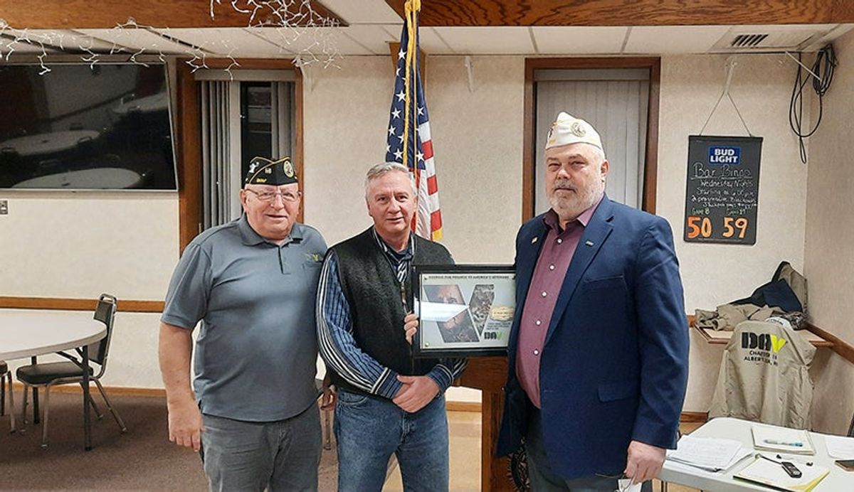 State DAV commander presents plaque to local DAV chapter for...