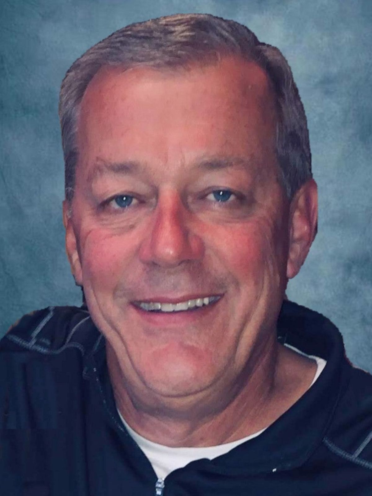 Mark E. Claassen