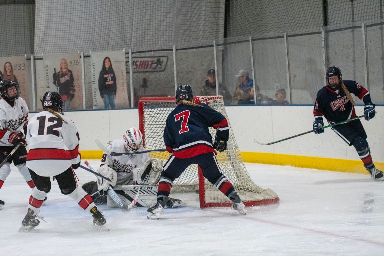 Tiger girls’ hockey remains unbeaten; Austinson scores 100th...