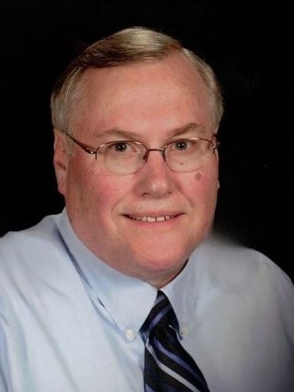 Leslie A. "Les" Flugum