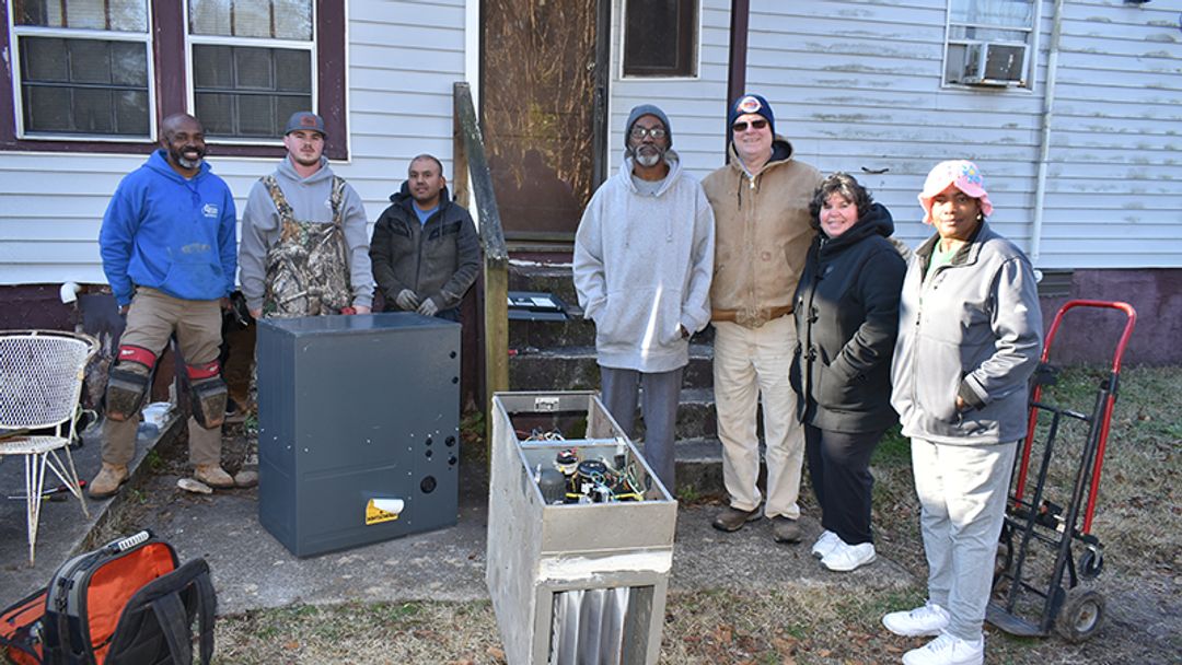 West Point woman receives new heating unit from Fuller Cente...