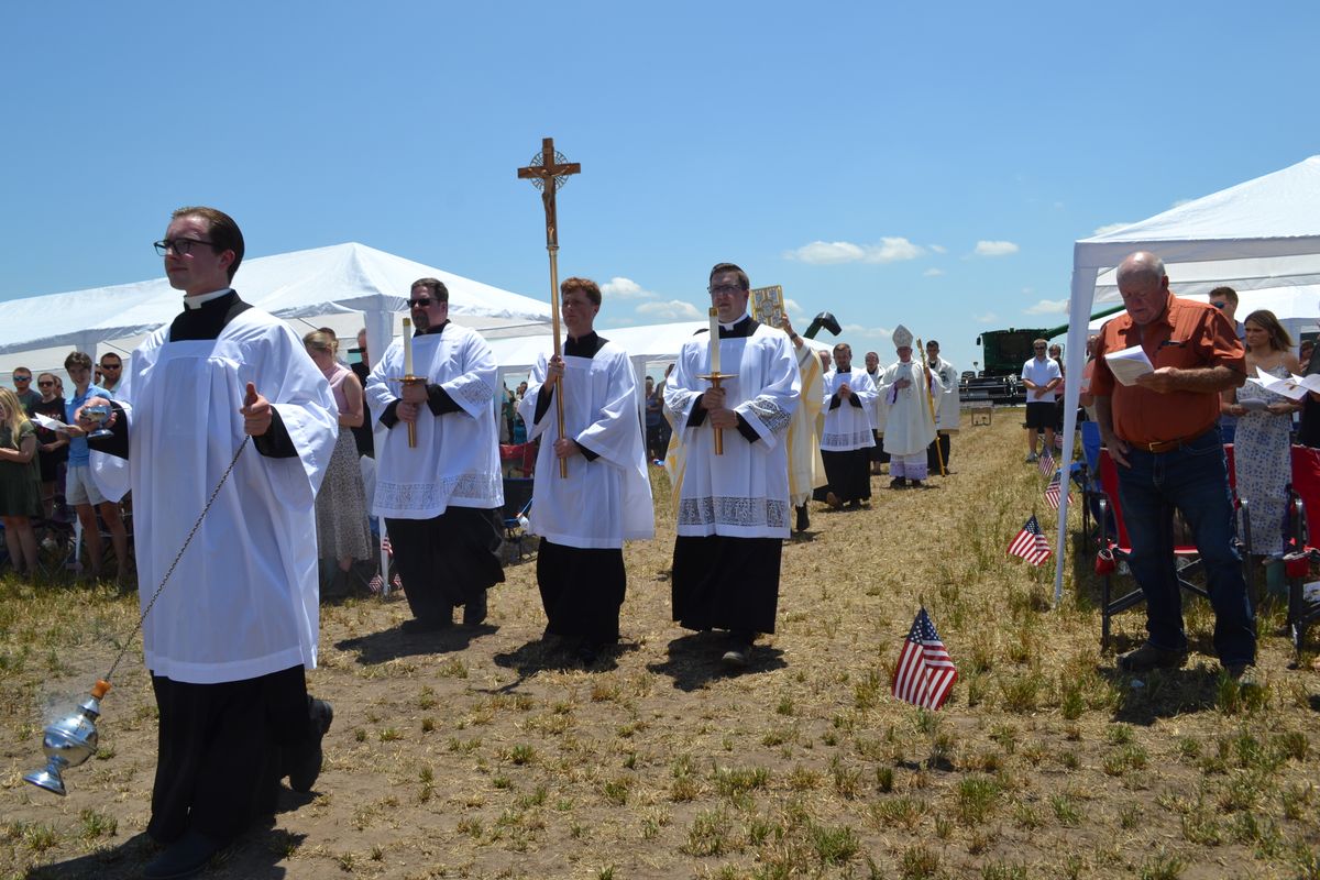At Scott County farm, first wheat harvest Mass honors 'unsun...