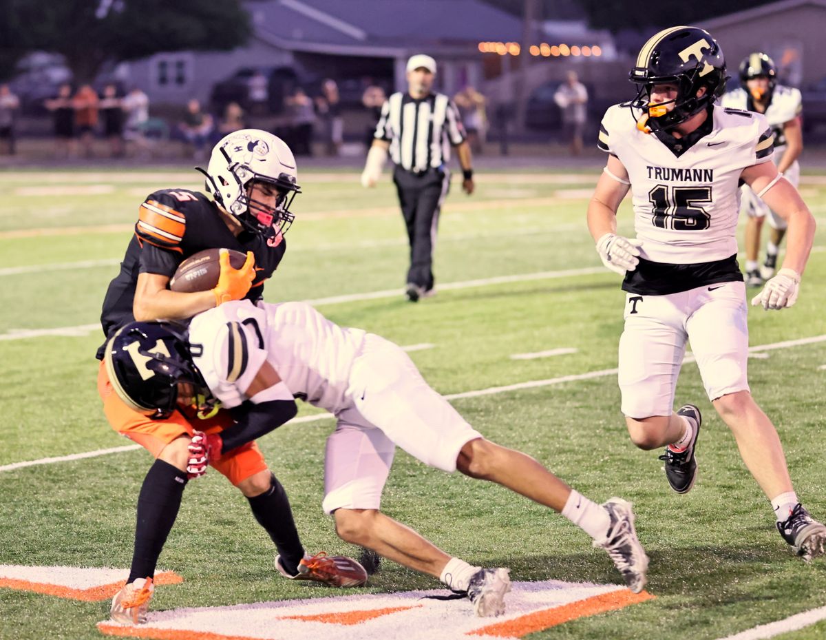 Trumann beats Harrisburg in county football action