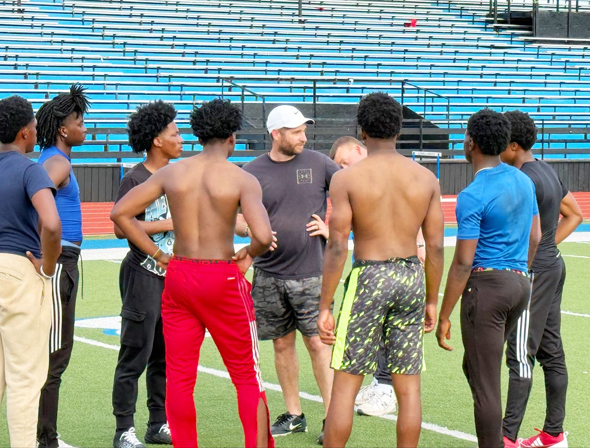 New Pirates football head coach/athletic director hired Chri...