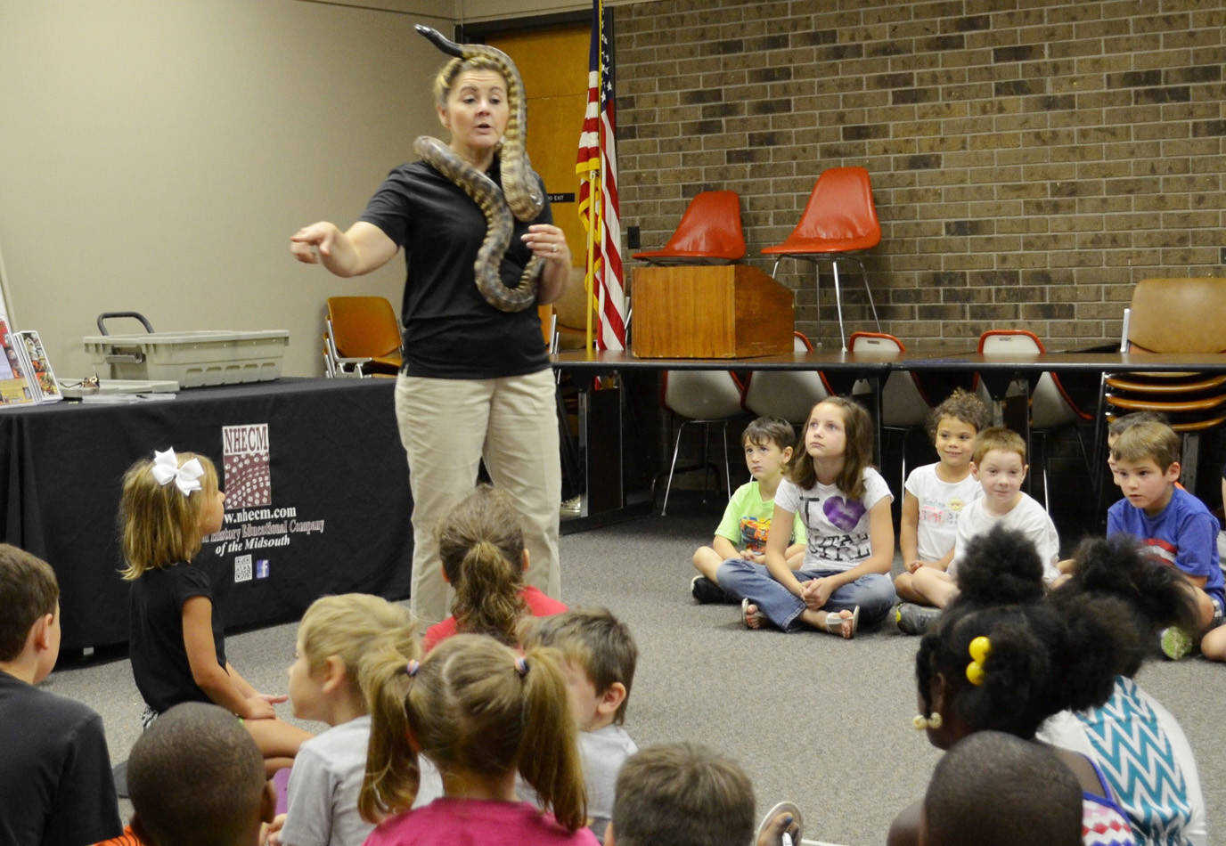Local children meet animals at library program