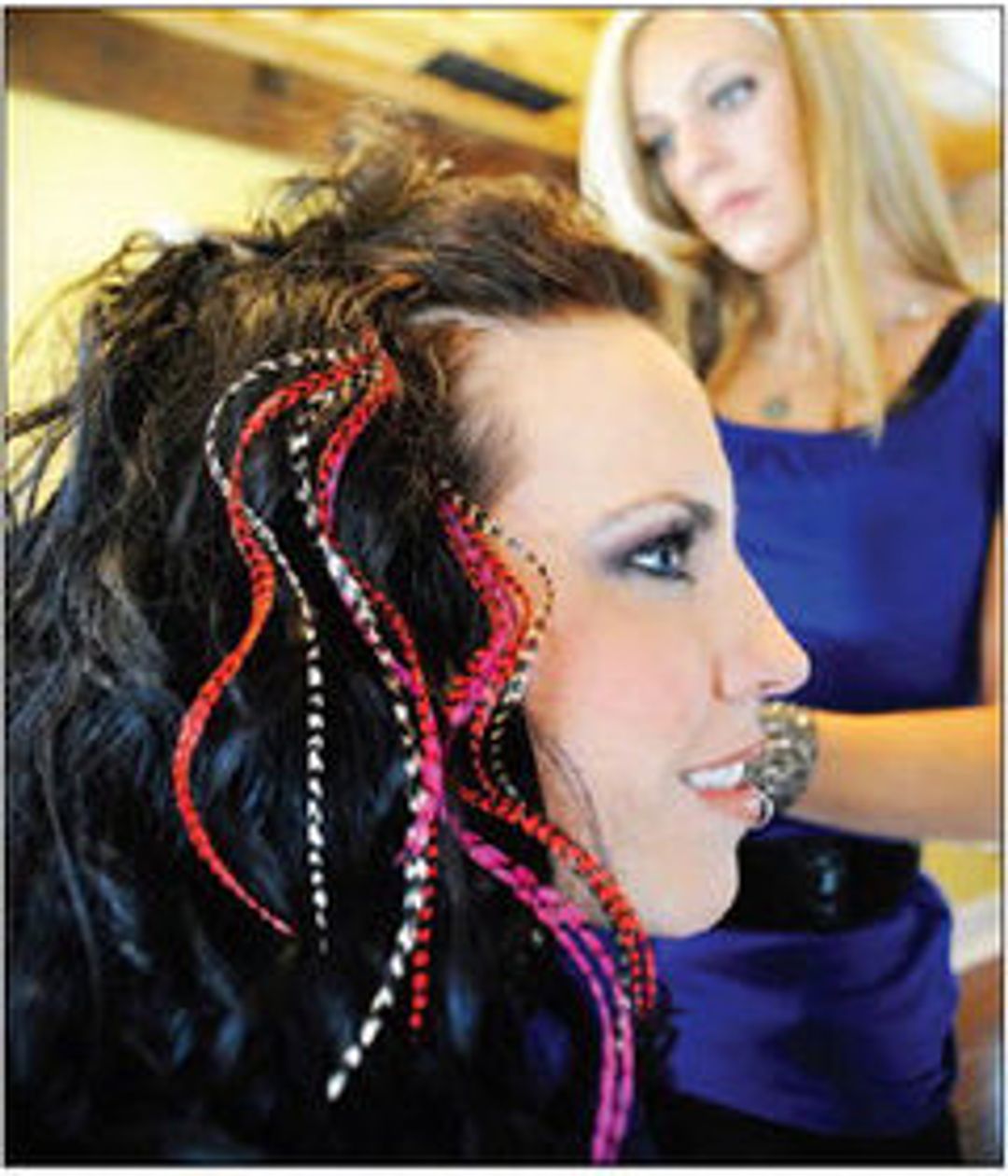 Fashion fad takes feathers from fishers