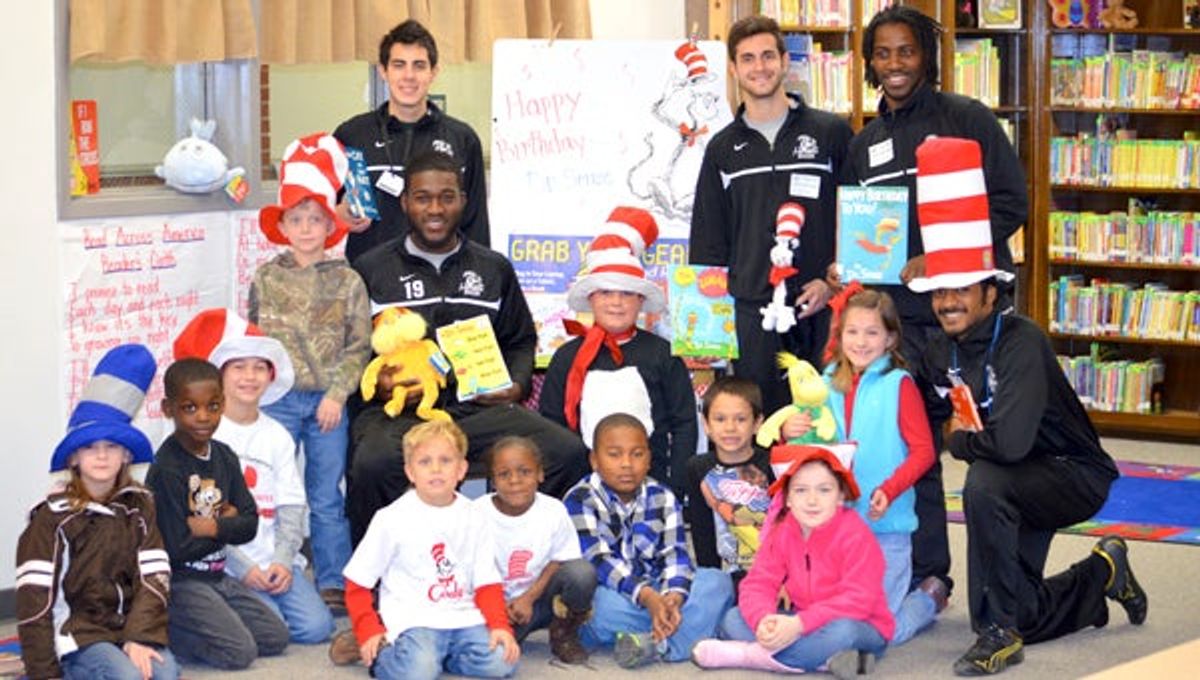 Concordia College soccer team reads for Valley Grande Elementary