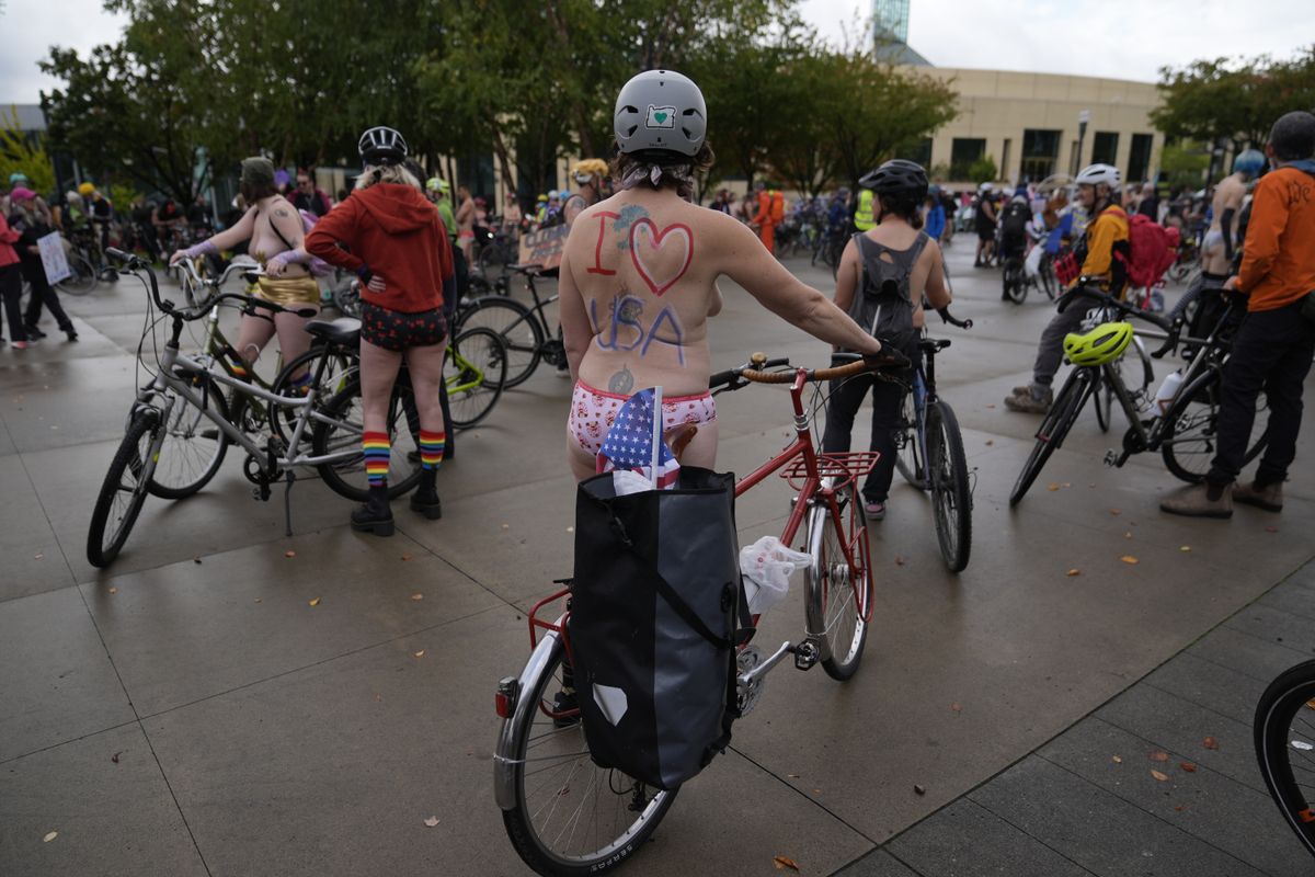 Naked bike riders demonstrate against federal troops in 'quintessentia...