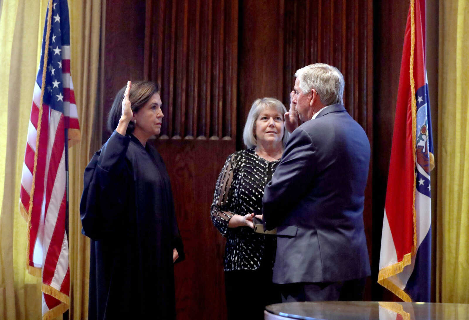 Governor quits in scandal, signs 'revenge porn' law