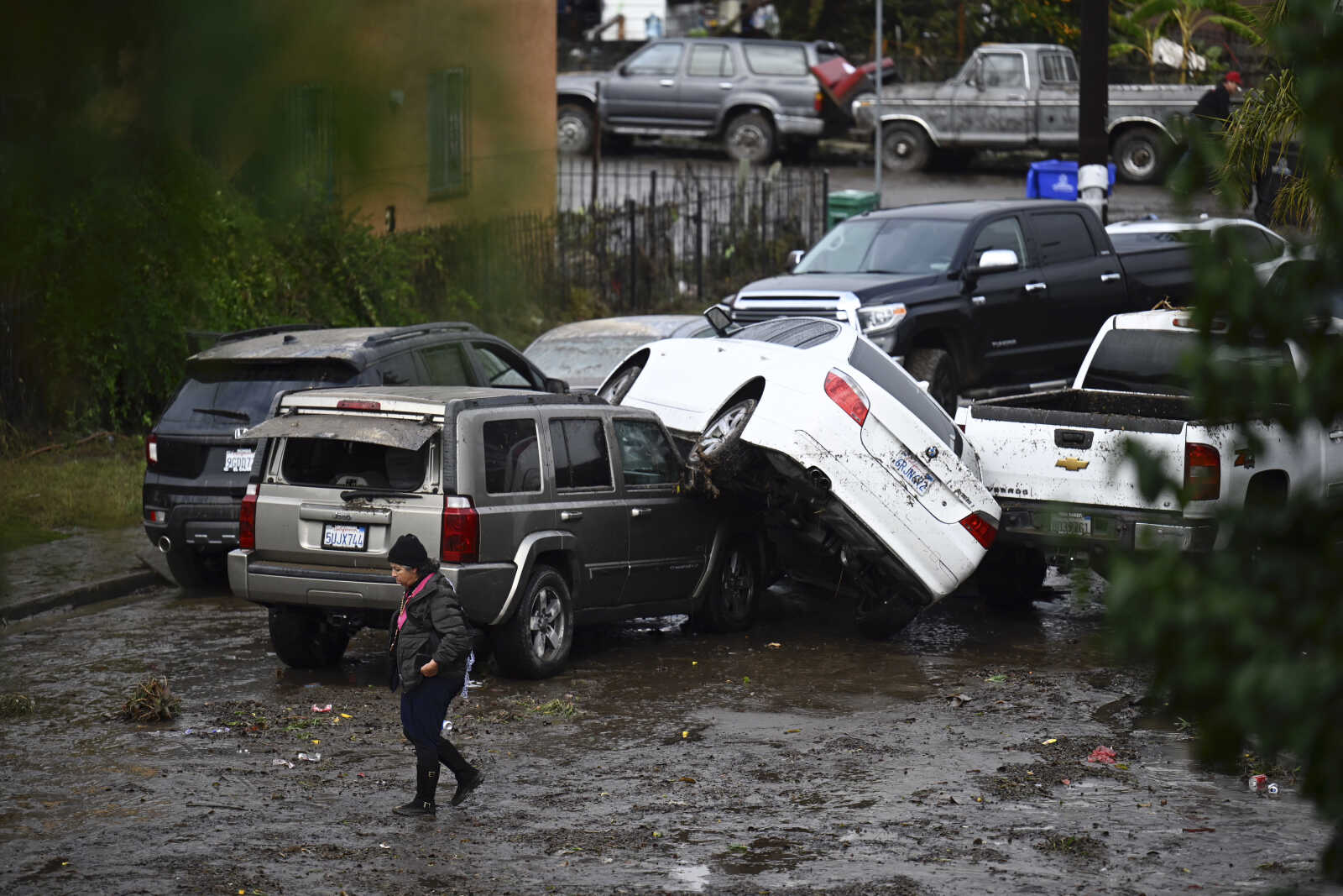 Flash floods inundate homes, overturn cars as heavy rains sweep throug...