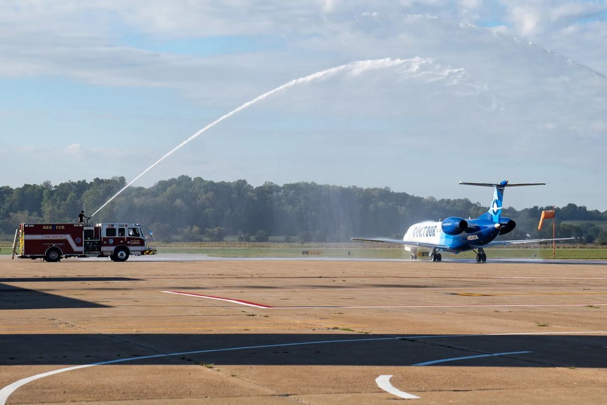 Water cannon salute, ribbon-cutting headline grand-opening c...