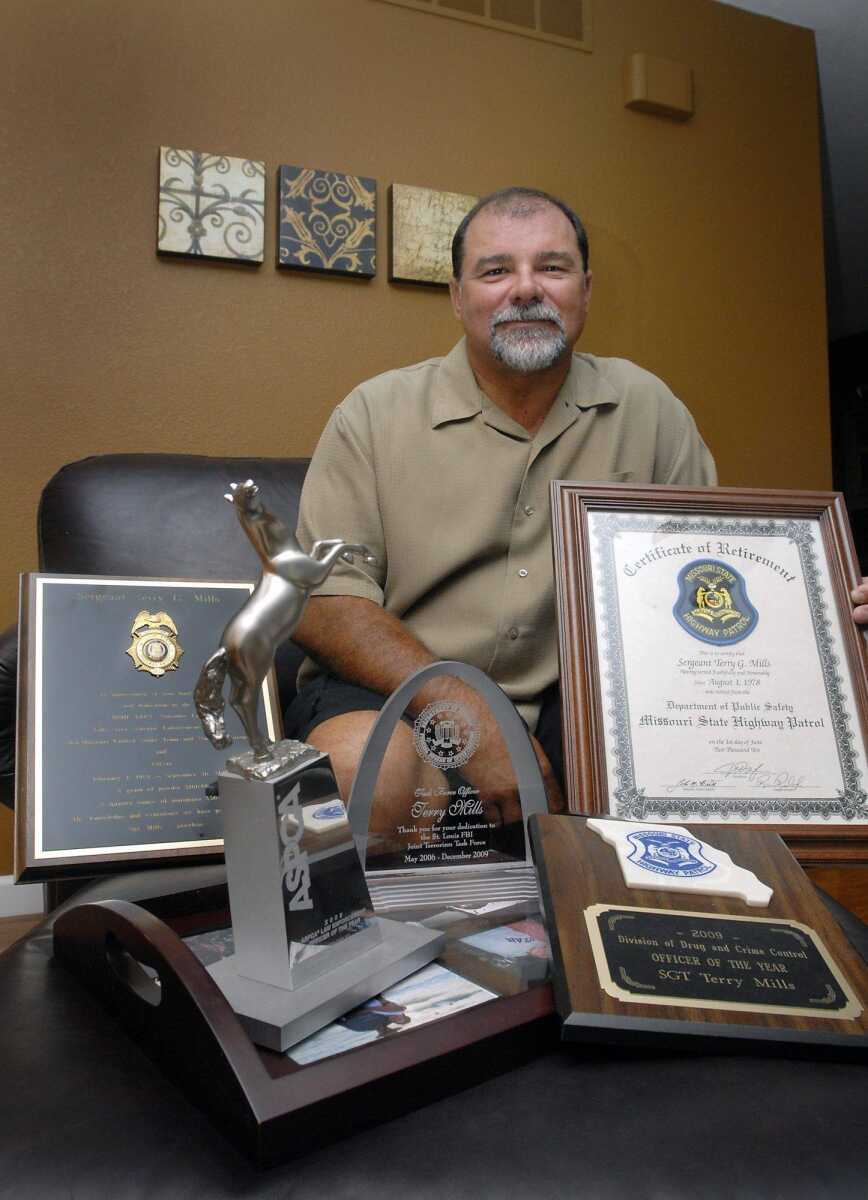 Retired state trooper honored for undercover work that saved dogs