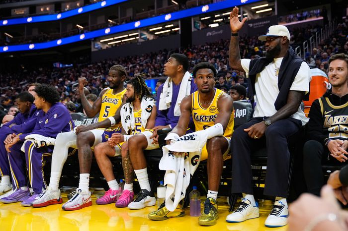 LeBron James will miss opening night of his record 23rd NBA season due...