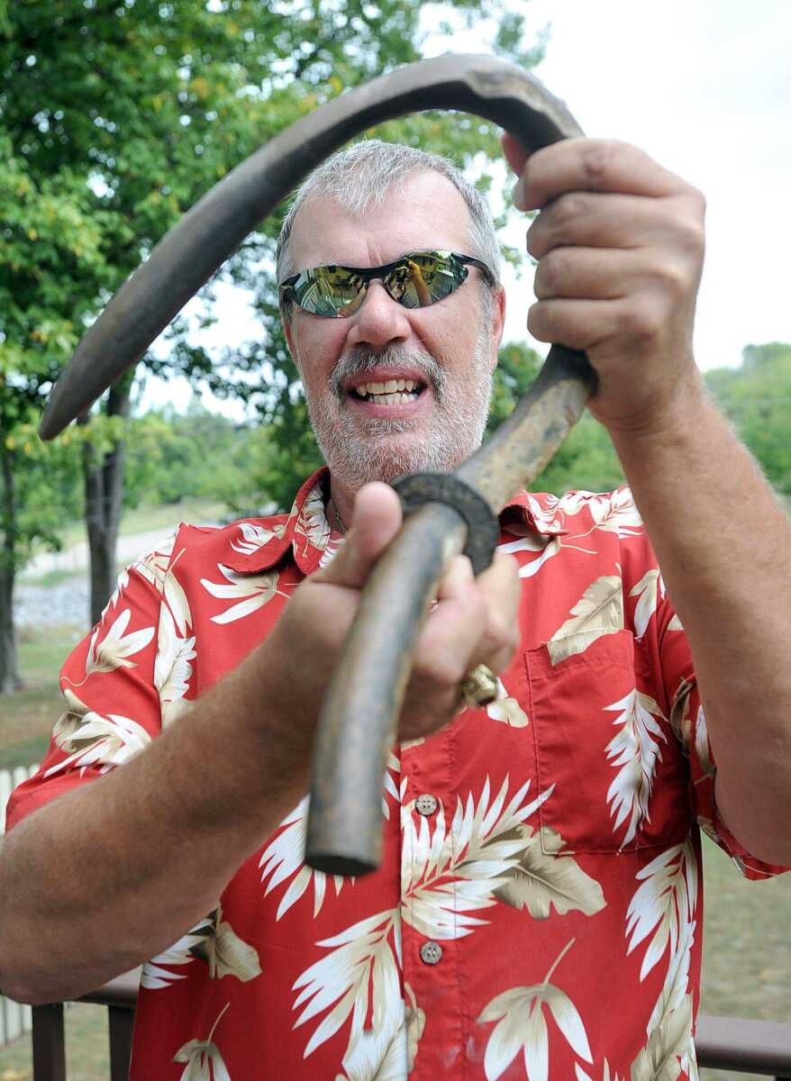 Randy Barnhouse makes a hobby of diving for treasures and sunken ships