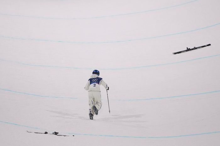 Defending Olympic champion Eileen Gu falls in her first run of freeski...