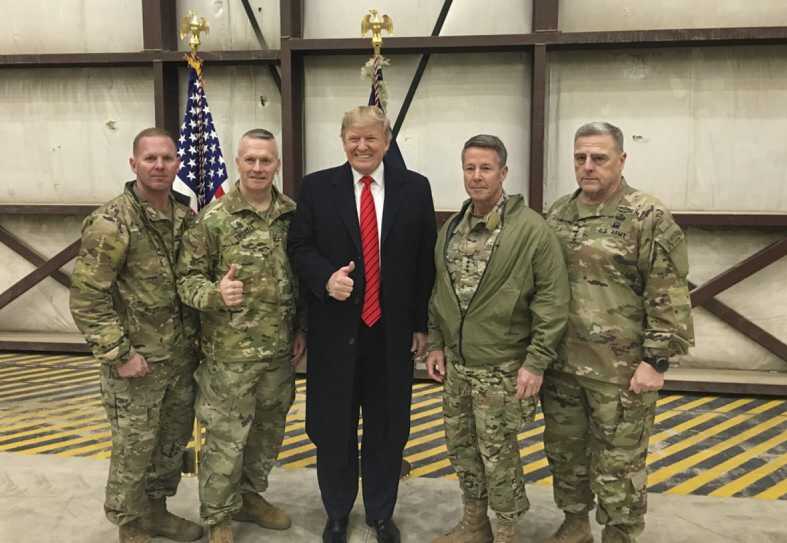 Local military leader Command Sgt. Maj. Timothy Metheny meets with Pre...