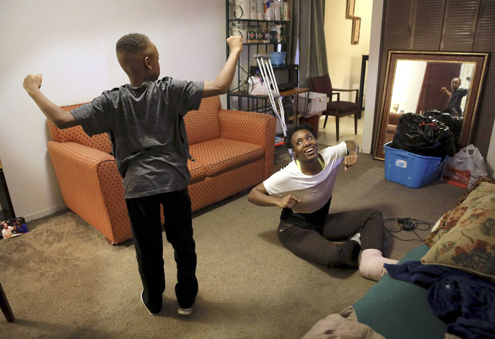 Woman says mistaken identify led to jail in St. Louis death