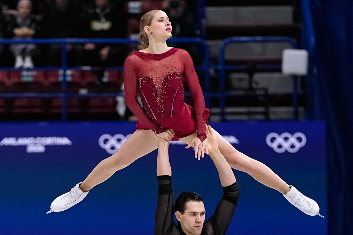 Hase and Volodin of Germany seize Olympic pairs lead as favorites stum...
