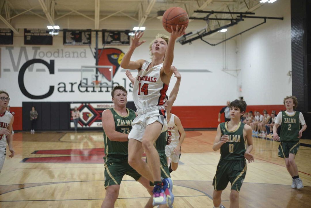 Cardinals score over 100 points to open Woodland Tournament with win